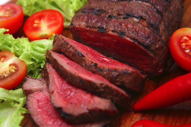 Red Meat Served on Wooden Plate with Vegetables Stock Image - Image of ...