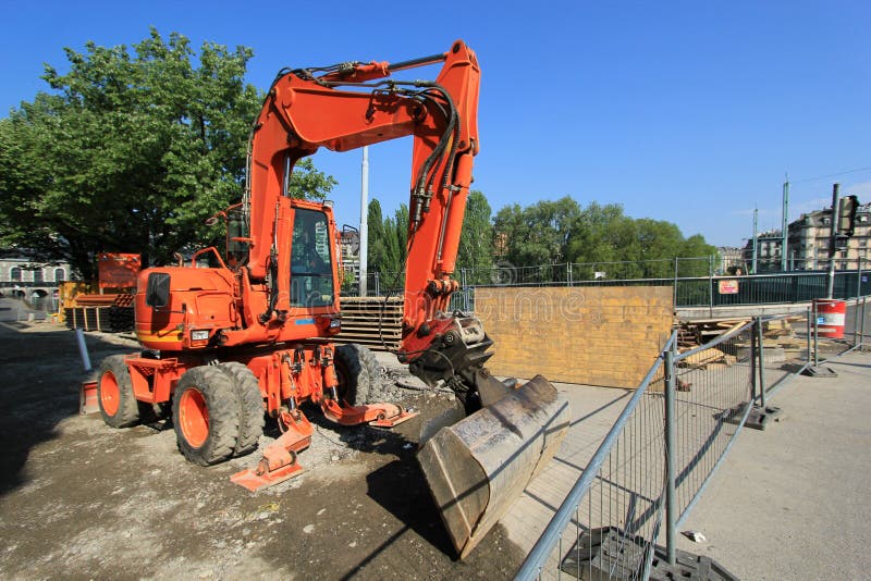 Orange Mechanical Digger in Forest Stock Photo - Image of dirt ...