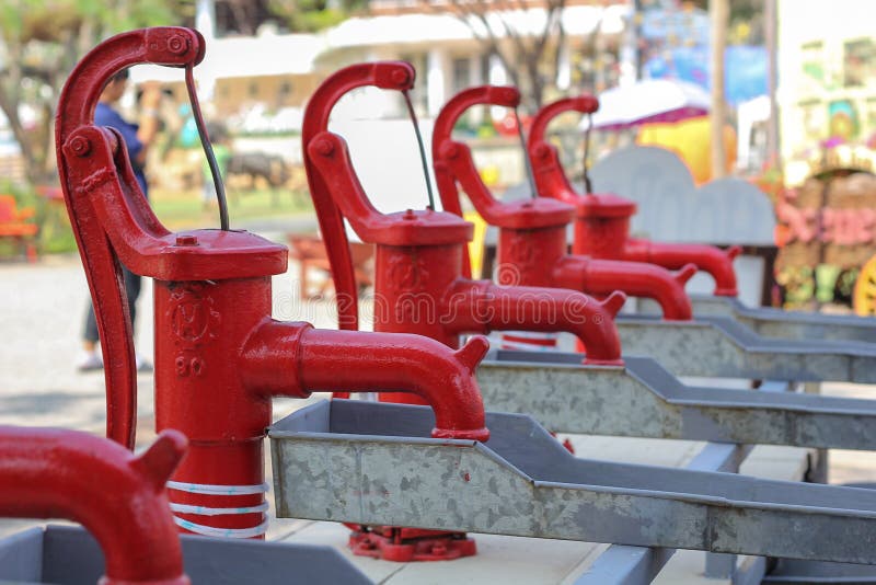 Red mechanical water pumps stock photo. Image of design - 29293874