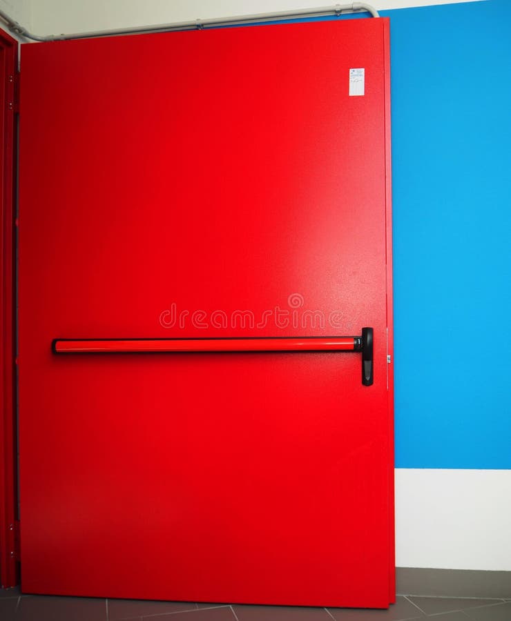 Red metal door stock photo. Image of doors, industrial - 87435044