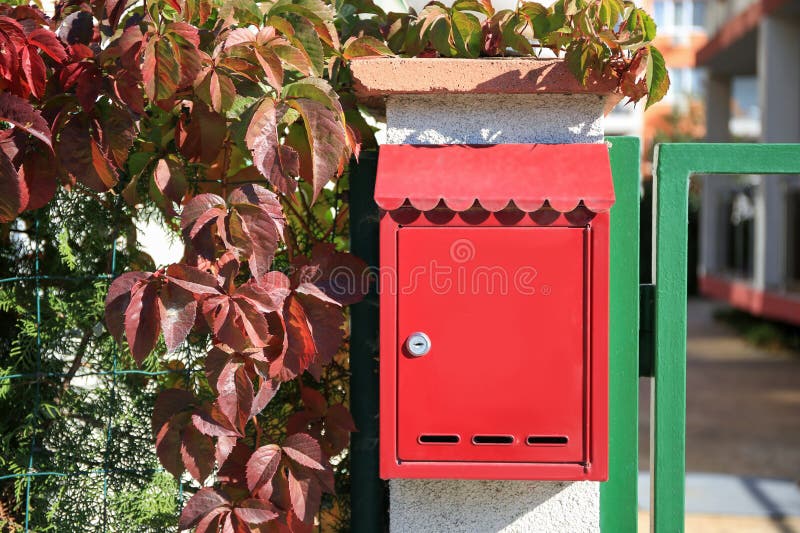Red Metal Letter Box on Stone Column Near Gate Outdoors Stock Image ...