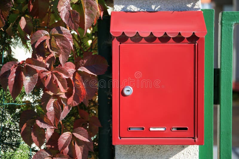 Red Metal Letter Box on Stone Column Near Gate Outdoors Stock Image ...