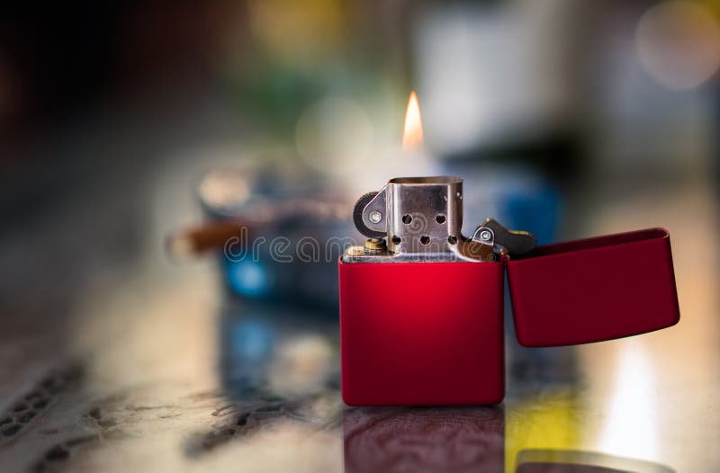 Metal lighter with flame stock image. Image of smoke - 114120655