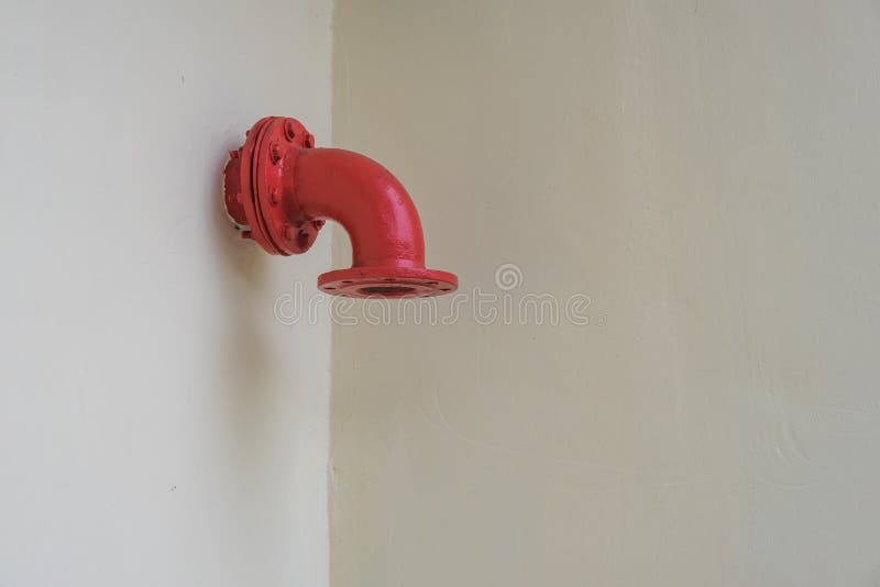 Red Metal Pipe on the White Wall Stock Image - Image of building, pipe ...