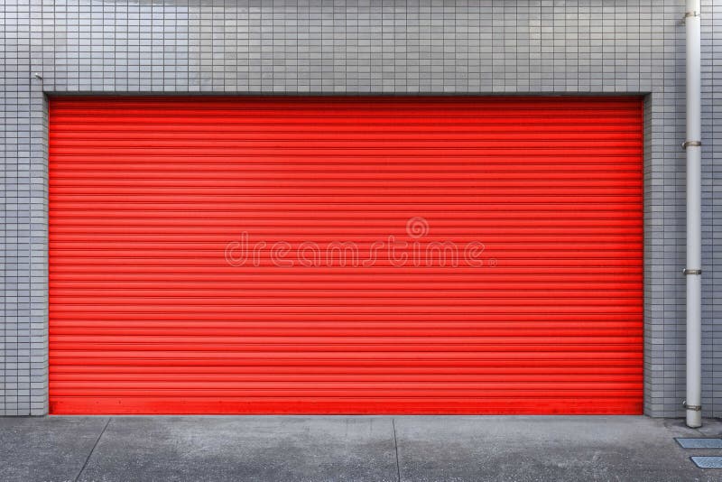 Red Metal Roller Shutter Doors on the Ground Floor of the House Stock ...