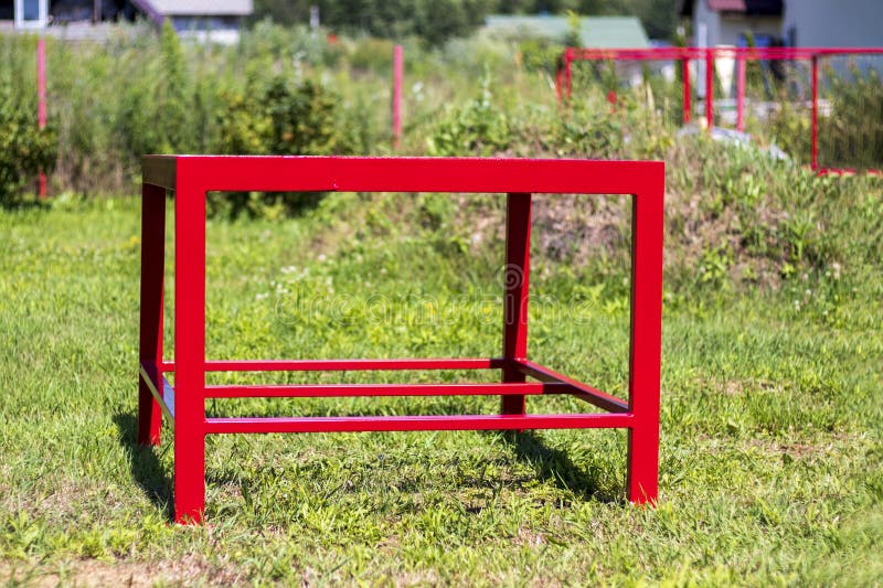 Red Metal Stand for Container, Water Tank. Shallow Depth of Field ...