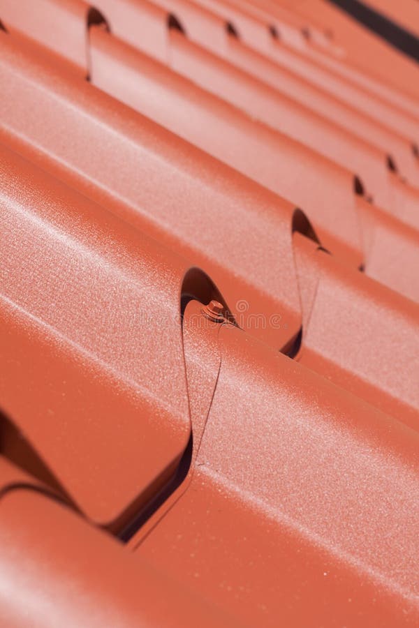 Red metal tile with screw. stock photo. Image of color - 91008976