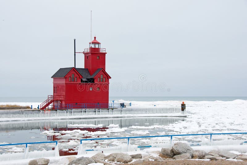 Michigan Red Lighthouse with Sailboat Stock Photo - Image of light ...