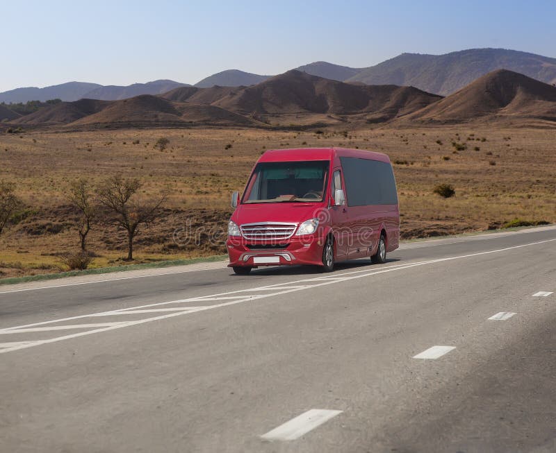 Red Minibus Moves on a Road in the Mountains Stock Photo - Image of ...
