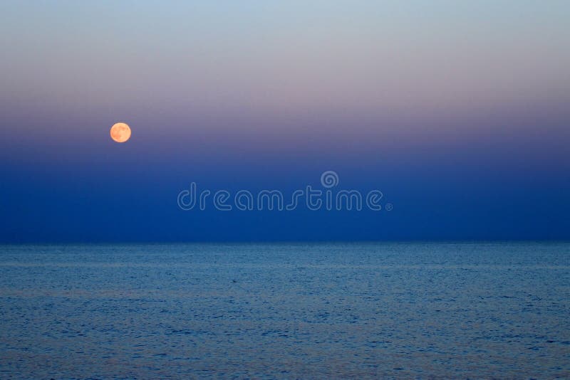Red Moon and Blue Sea at Nightfall Stock Photo - Image of darkness ...