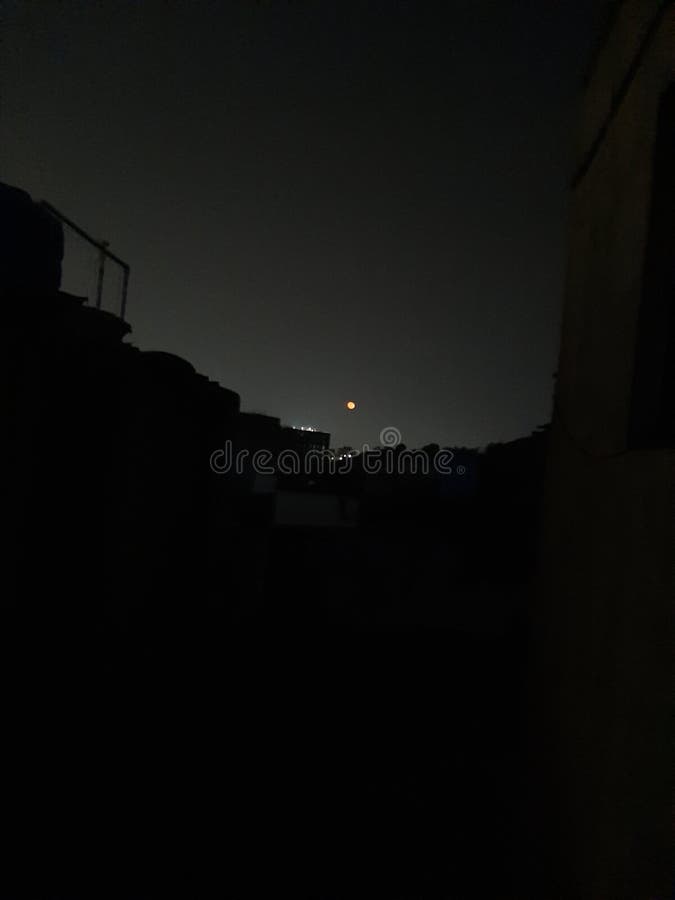 Red moon in dark shadow stock photo. Image of distance - 167232804