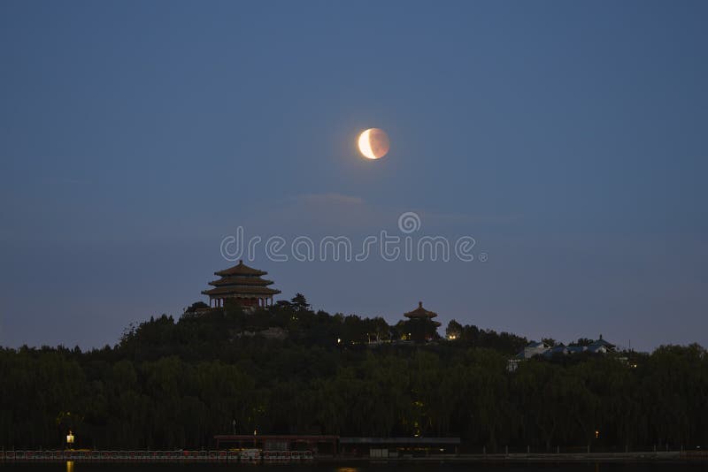 Red Moon in Night Sky and Silhouette of Chinese Architecture Stock ...