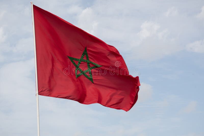 Red Moroccan Flag Waving in the Wind Stock Photo - Image of landmark ...