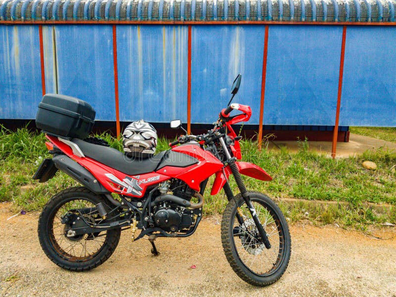 Red Motorcycle Outside after a Ride Stock Photo - Image of bike, ride ...