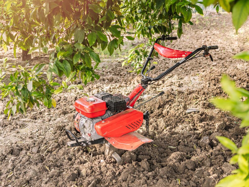 Red Motorized Tiller in Action on Farm Stock Image - Image of ...