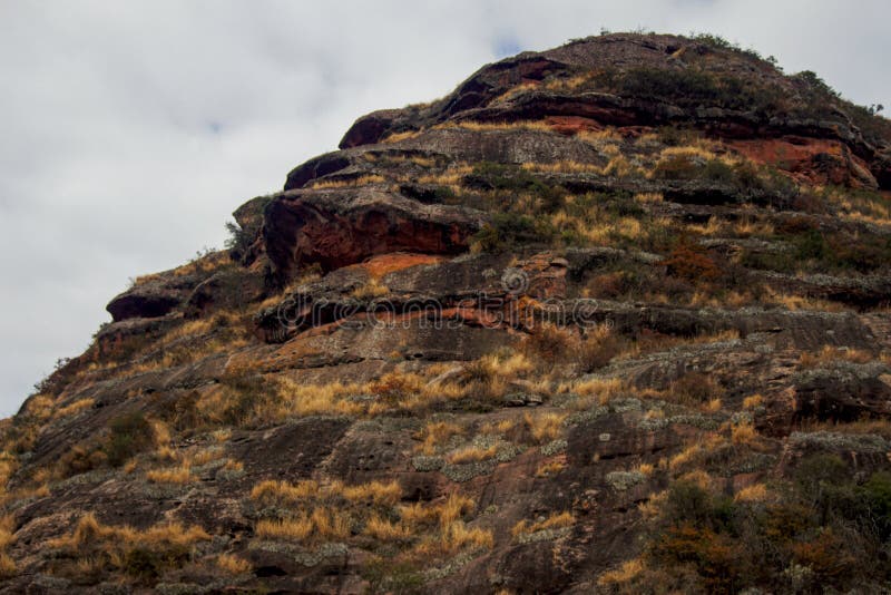 Red Mountain with Red Stones Stock Image - Image of cliff, striking ...