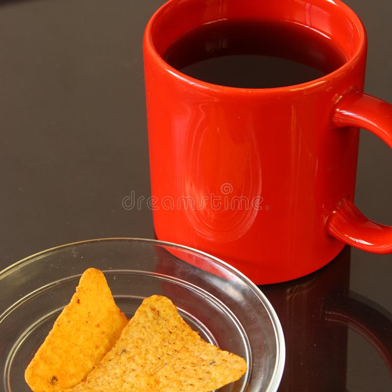 Red mug and chips stock photo. Image of glass, table - 11240312