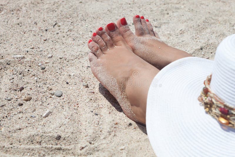 Red Nailed Toes of a Woman on the Beach Stock Photo - Image of white ...