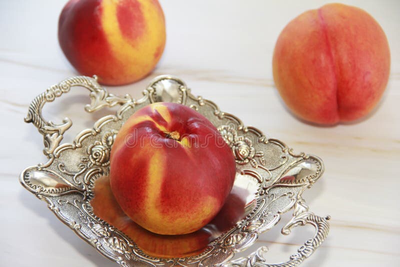 Red Nectarine in a Decorative Plate Stock Photo - Image of healthy ...