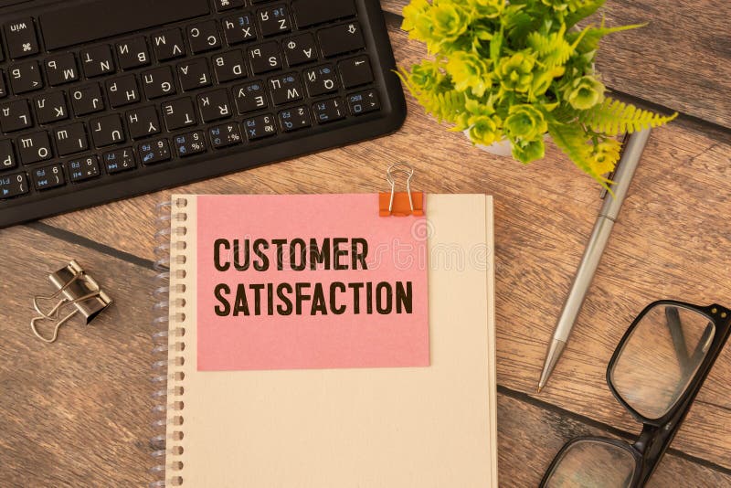 On a Red Notepad a Sheet of Paper with Text Customer Satisfaction Stock ...