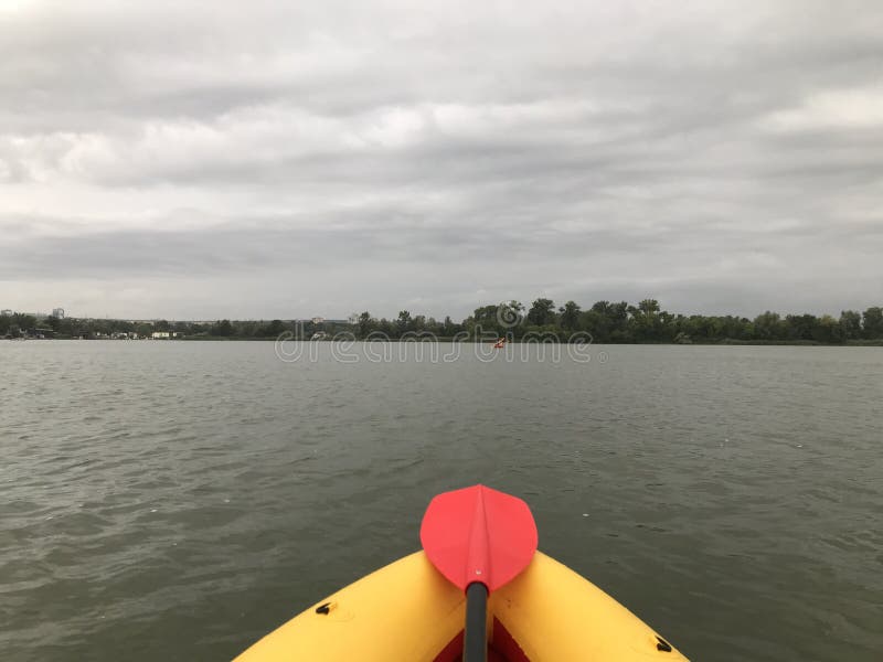 Red Oar in Yellow Kayak on the River Stock Photo - Image of city, green ...