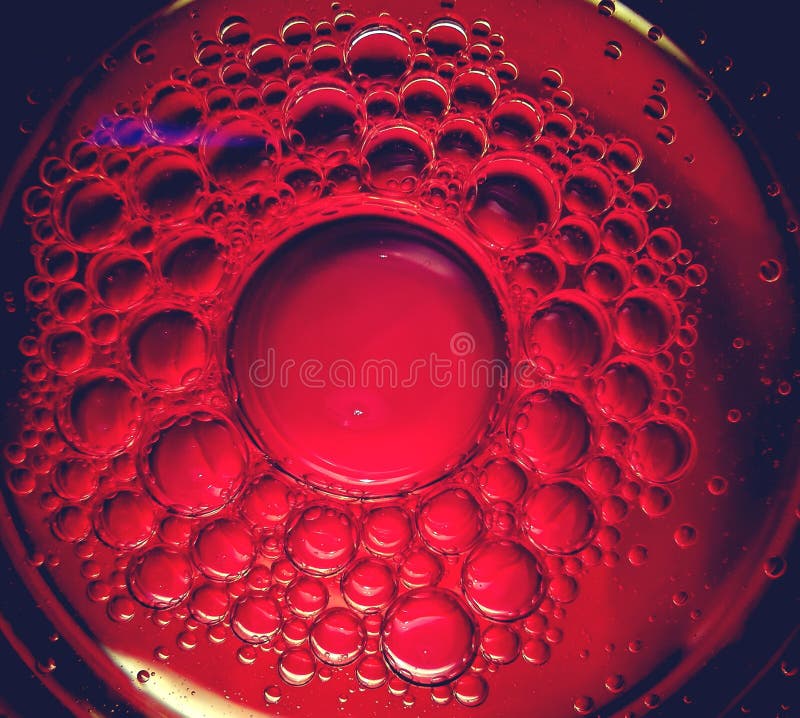 Red Oil Bubbles in the Glass of Water Stock Photo - Image of design ...