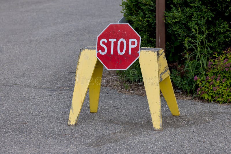 A Red Old Stop Sign on Yellow Stand Stock Image - Image of railroad ...