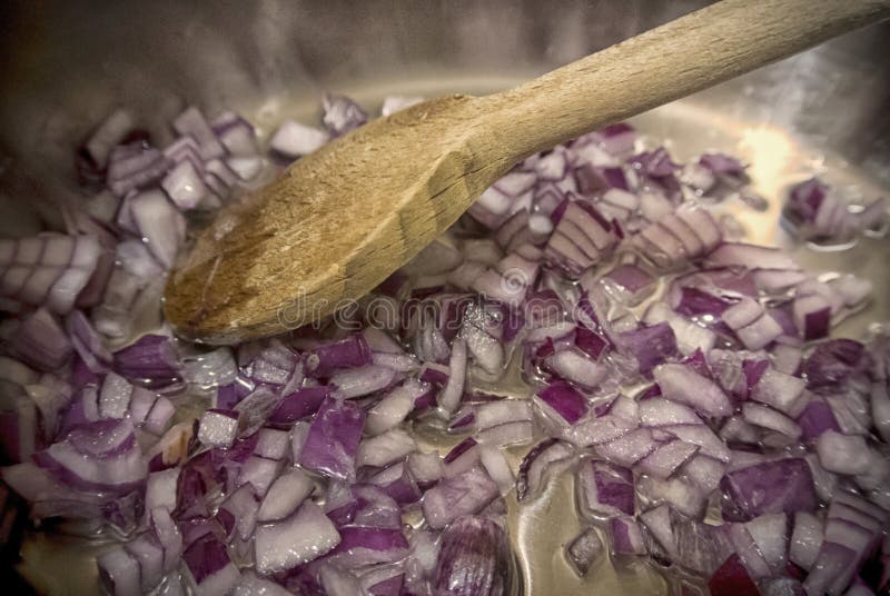 Onion Sizzling in a Pan stock photo. Image of lunch - 125503880