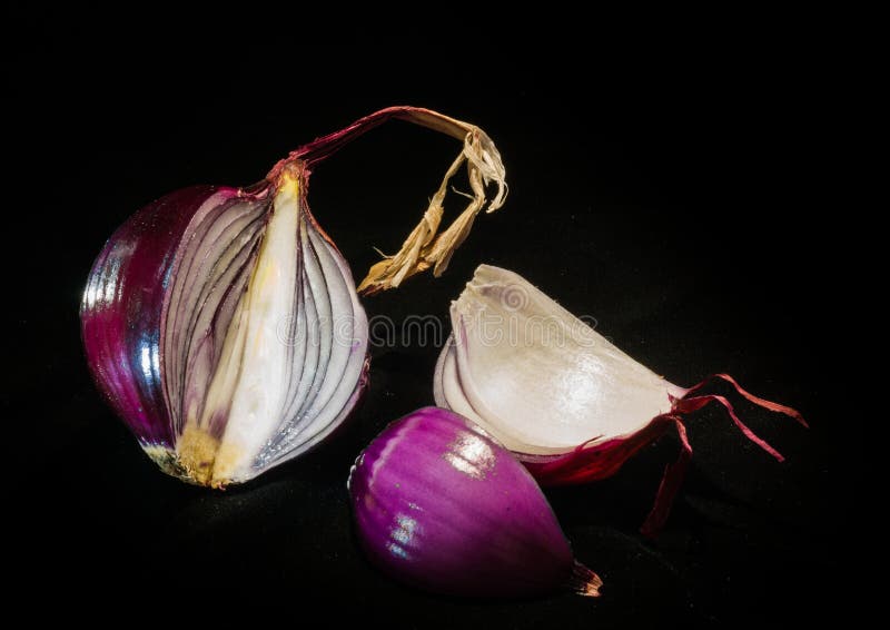 Red Onion -Opened Up on Black Stock Image - Image of bulb, colorful ...