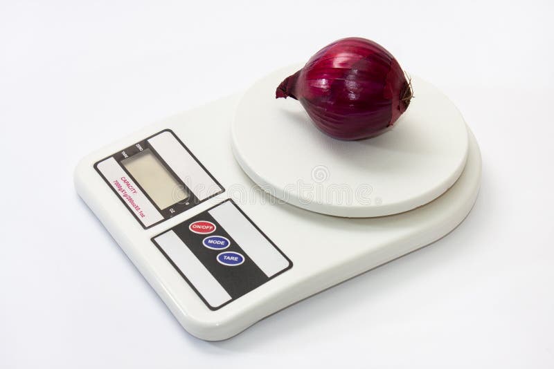 Onion on a scale plate stock image. Image of measurement - 17685711