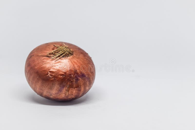 Red Onion on a Light Grey Surface in Closeup Stock Photo - Image of ...