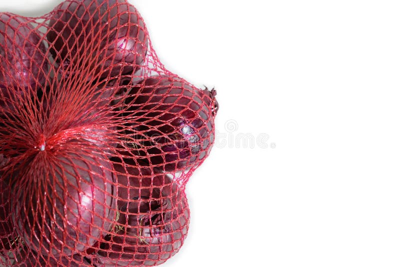 Red Onion in a Shopping Plastic Mesh. Close-up, Copy Space Stock Image ...