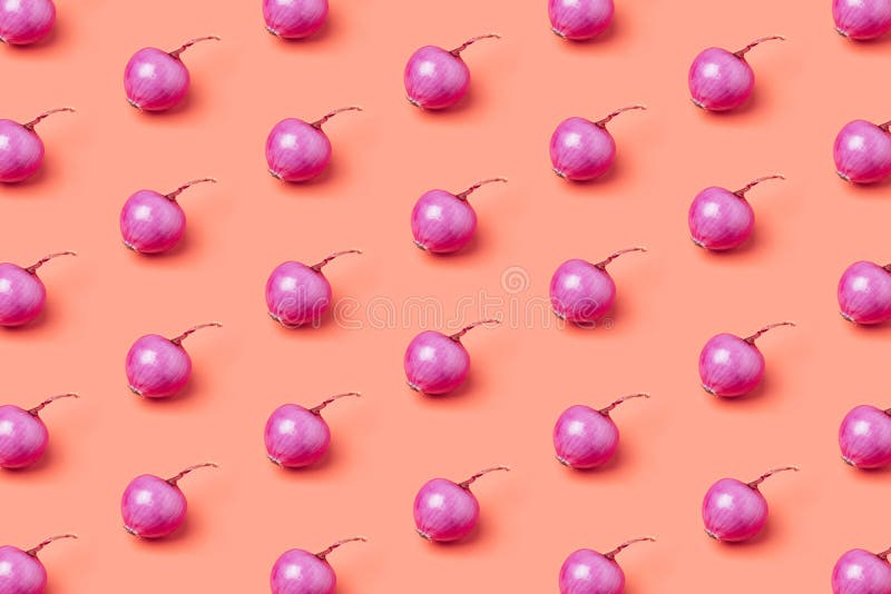 Red Onions Arranged on a Pastel Pink Background. Stock Image - Image of ...