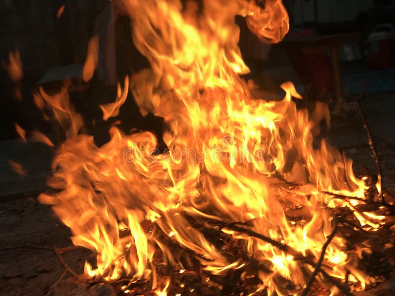 Red-orange Fire Lit on Rocks Stock Photo - Image of fire, sticks: 140329464