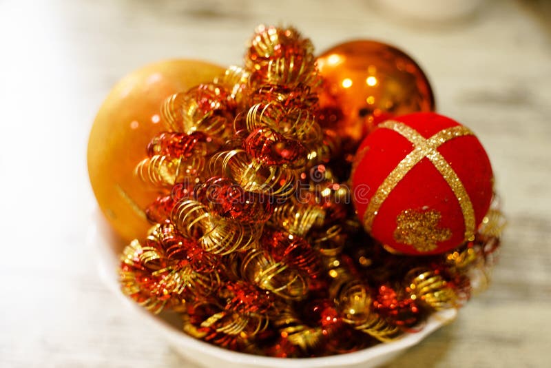 Red and Orange Tinsel and Orange and Red Christmas Balls Stock Photo ...