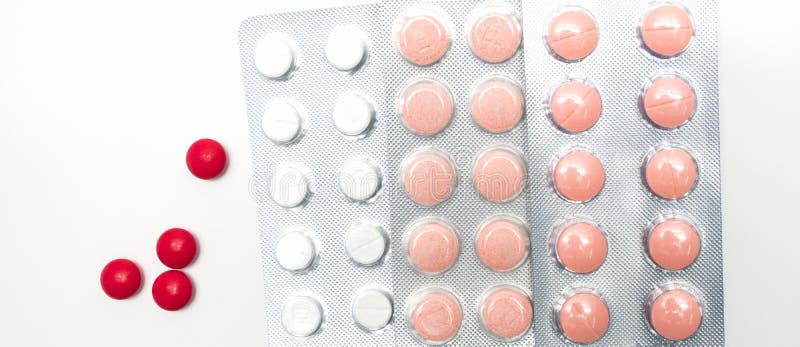 Red, Orange and White Tablet Pills Stock Photo - Image of ...