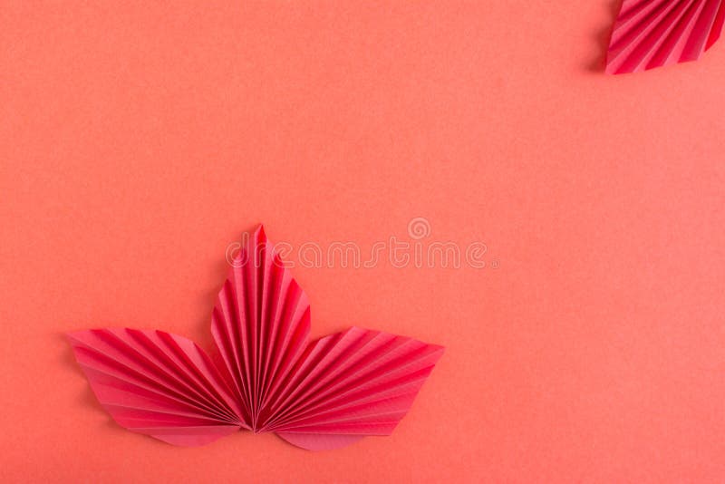 Red Orgami Leaves on a Red Background. Monochrome Background Stock ...