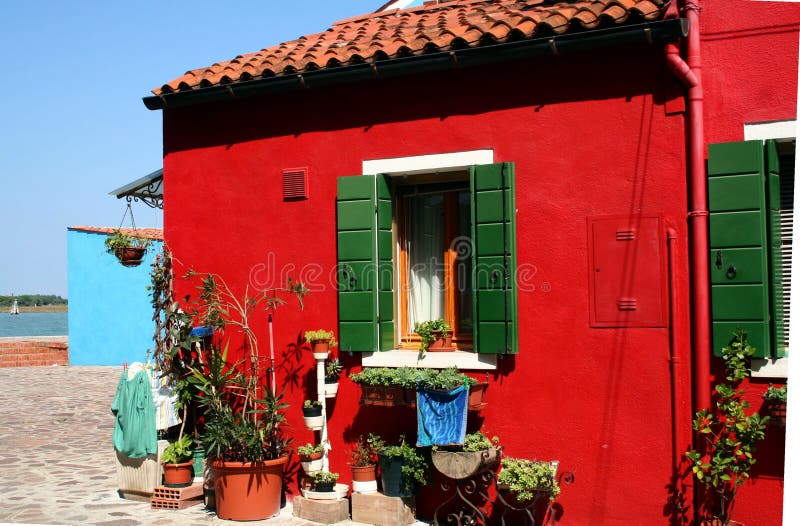 Red painted cottage stock photo. Image of charm, veneto - 234664