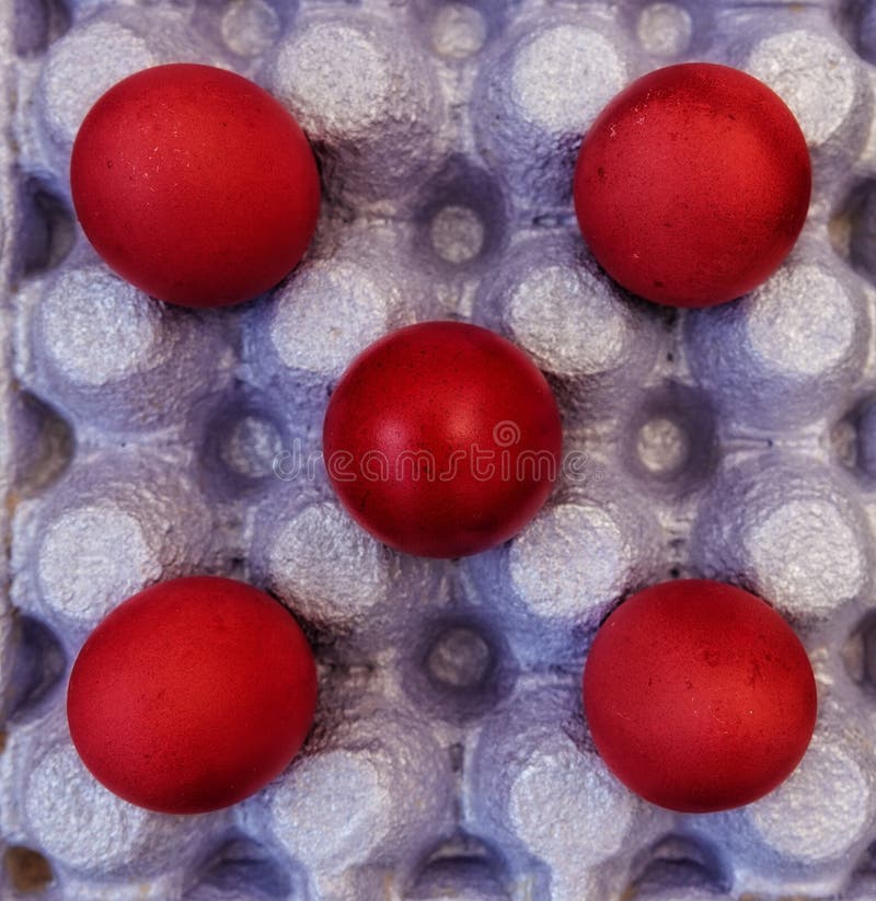 Red Painted Easter Eggs on an Egg Cardboard Stock Image - Image of ...
