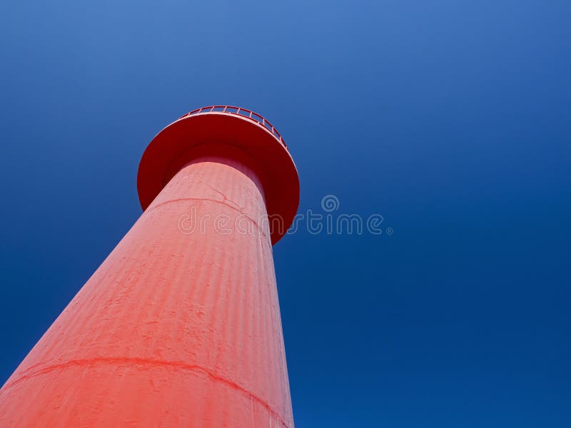 Red Painted Lighthouse and Blue Sky Stock Photo - Image of painted ...