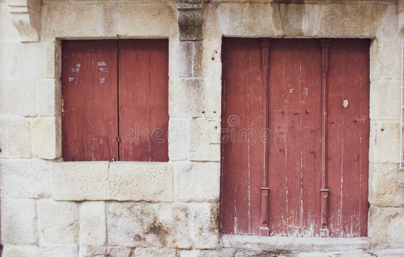 Red Painted Wooden Door on Stone Frame in Medieval Village Stock Photo ...