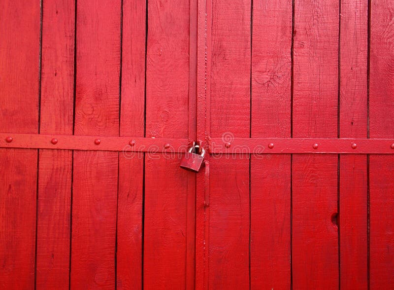 Red Painted Wooden Gate with a Lock in the Center Stock Image - Image ...