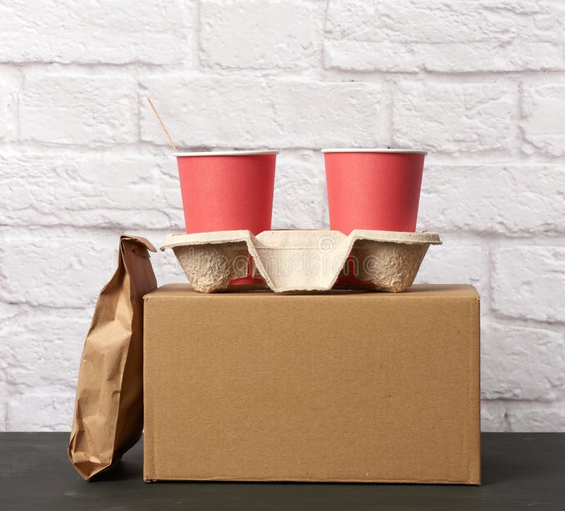Red Paper Disposable Cups Stand in the Tray, White Background Stock ...