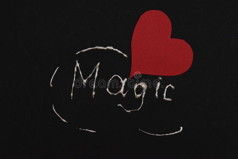 Red Paper Heart and the Inscription Magic on a Dark Background Stock ...