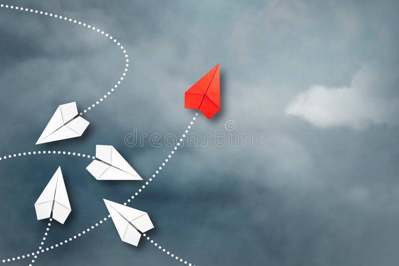 Red Paper Plane Flying in a Different Direction Than the White Ones ...