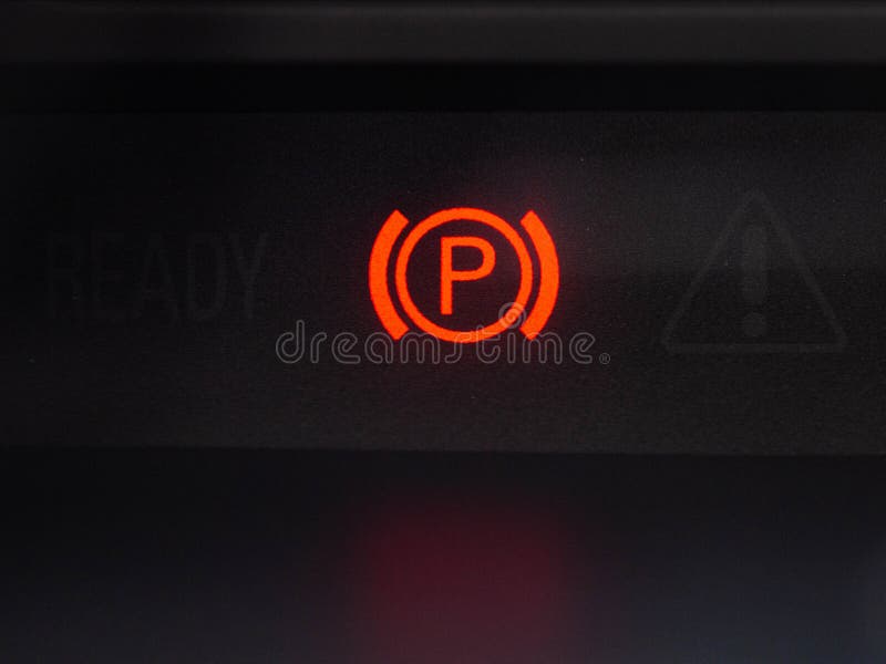 Red Parking Brake Icon on the Dashboard of a Car. Brake Failure. Close ...