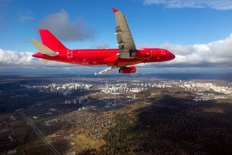 Red Passenger Plane in Flight. Side View. Stock Image - Image of ...