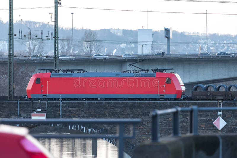 Red Passenger Train Speeding on a Bridge Stock Photo - Image of ...