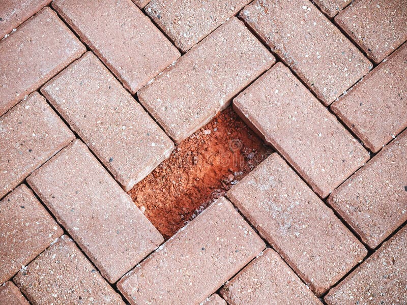Red Paving Slabs with One Missing Piece. Close-up Photo Stock Image ...