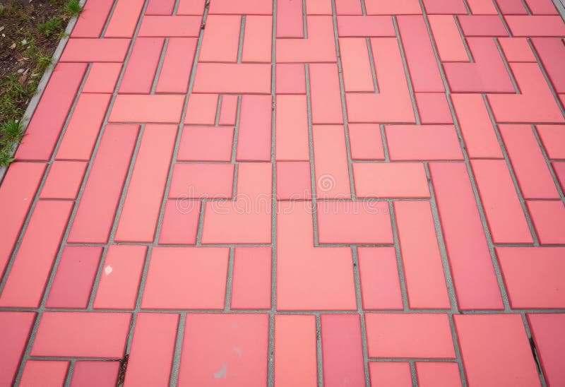 A Red Paving Stone Sidewalk, with Neatly Arranged Rectangular Stones ...